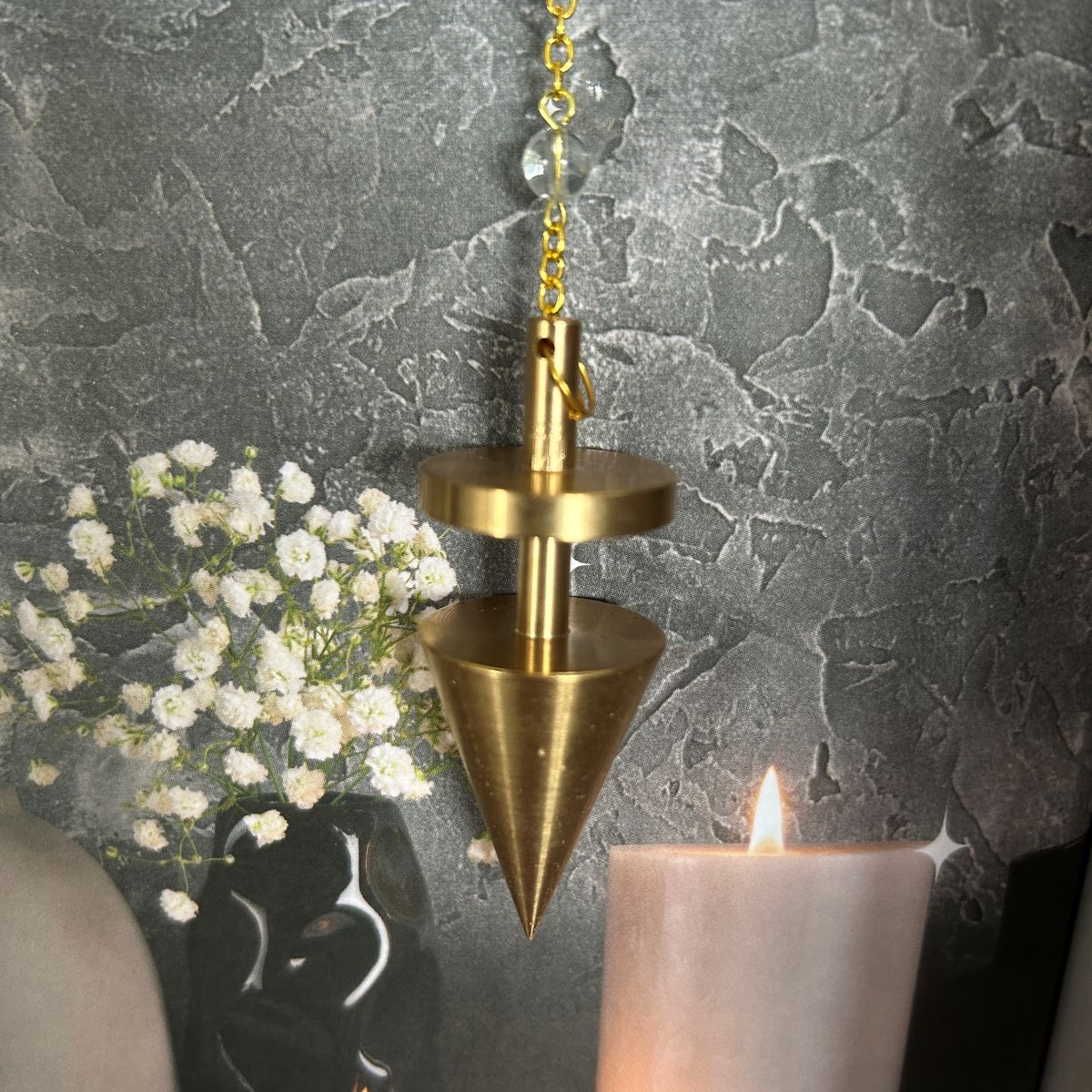 Pendule Harmonie Jocelyne Fangain en métal - La Porte des Secrets